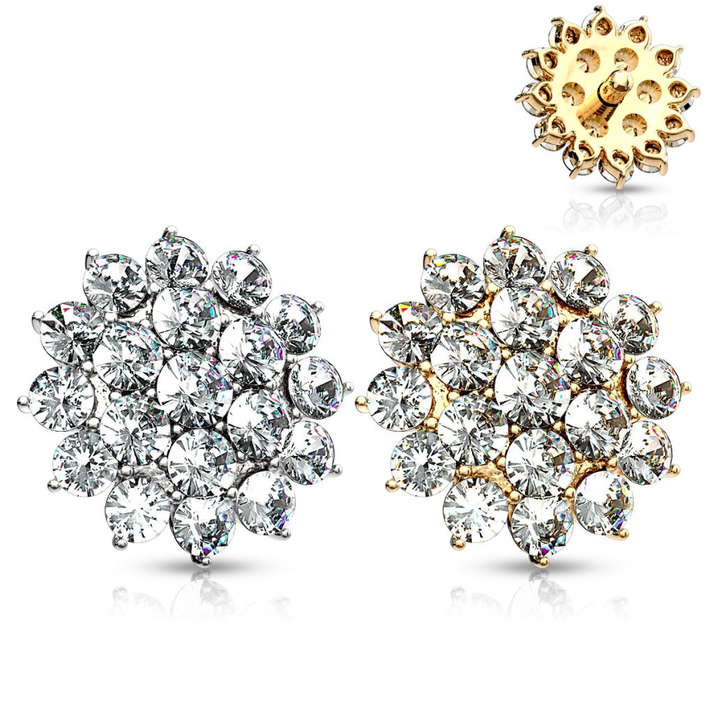 Beautiful 14k gold dermal top with a flower charm with stones