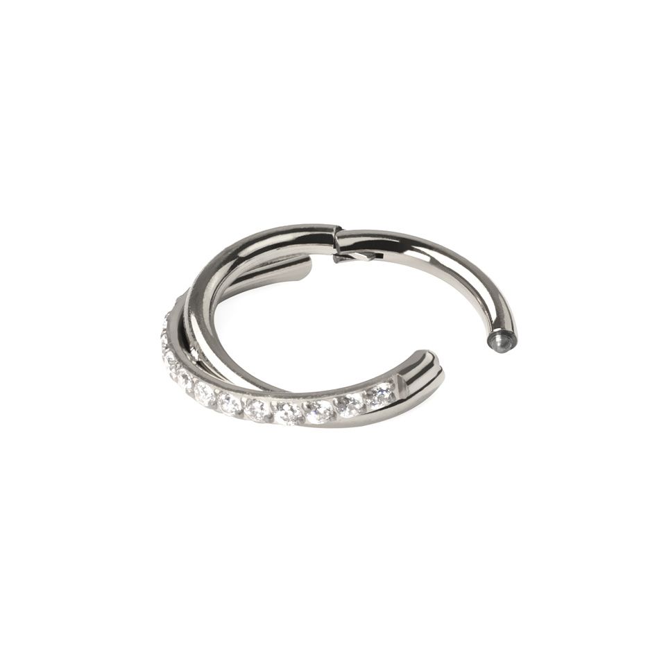 Hinged piercing ring with stone-paved crossover arch